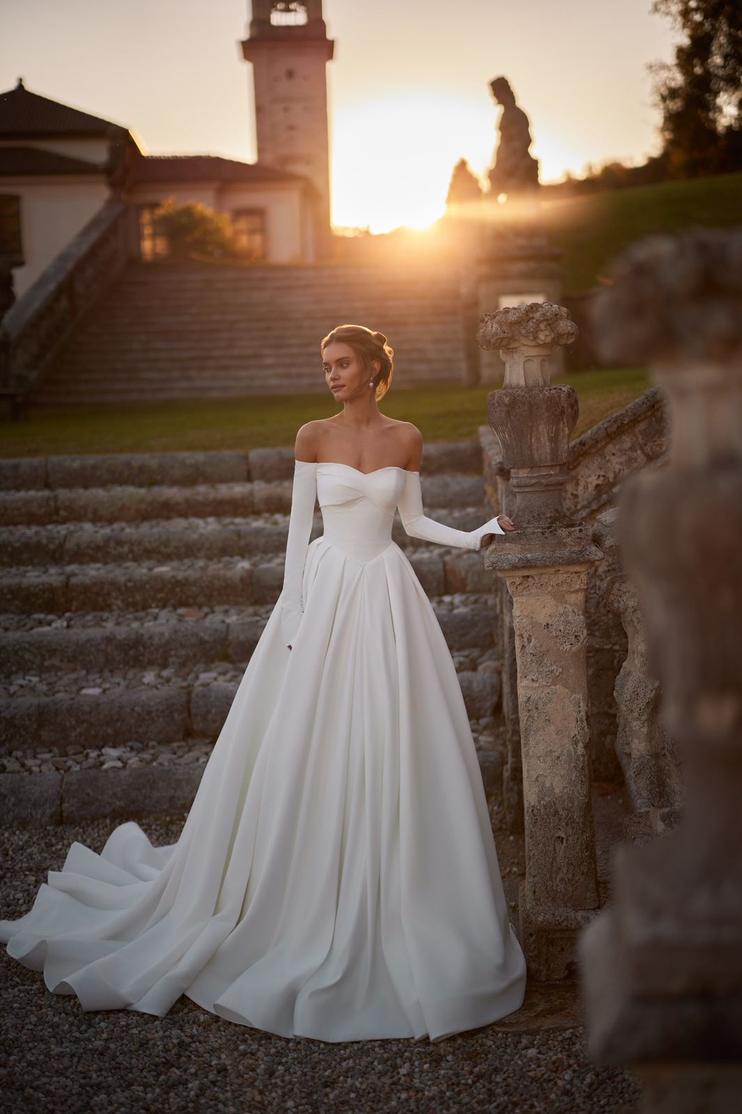 # IVORA Satin gown with pleated skirt – Reflections Bridal Studio